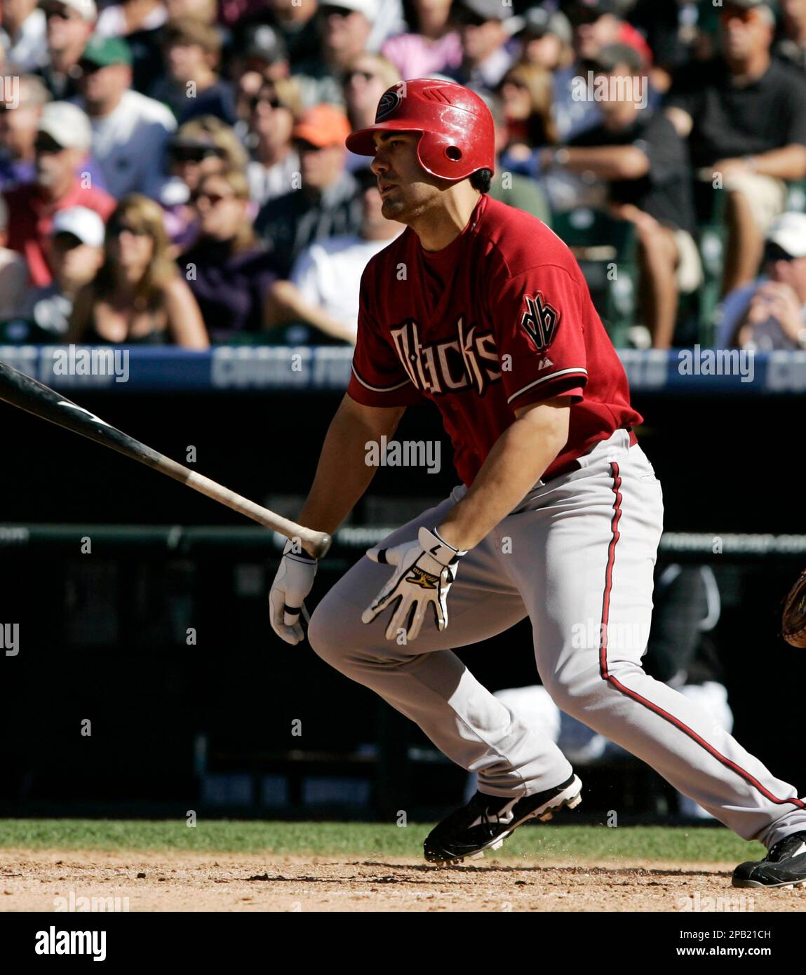 Arizona Diamondbacks' Carlos Quentin heads to first after hitting an ...
