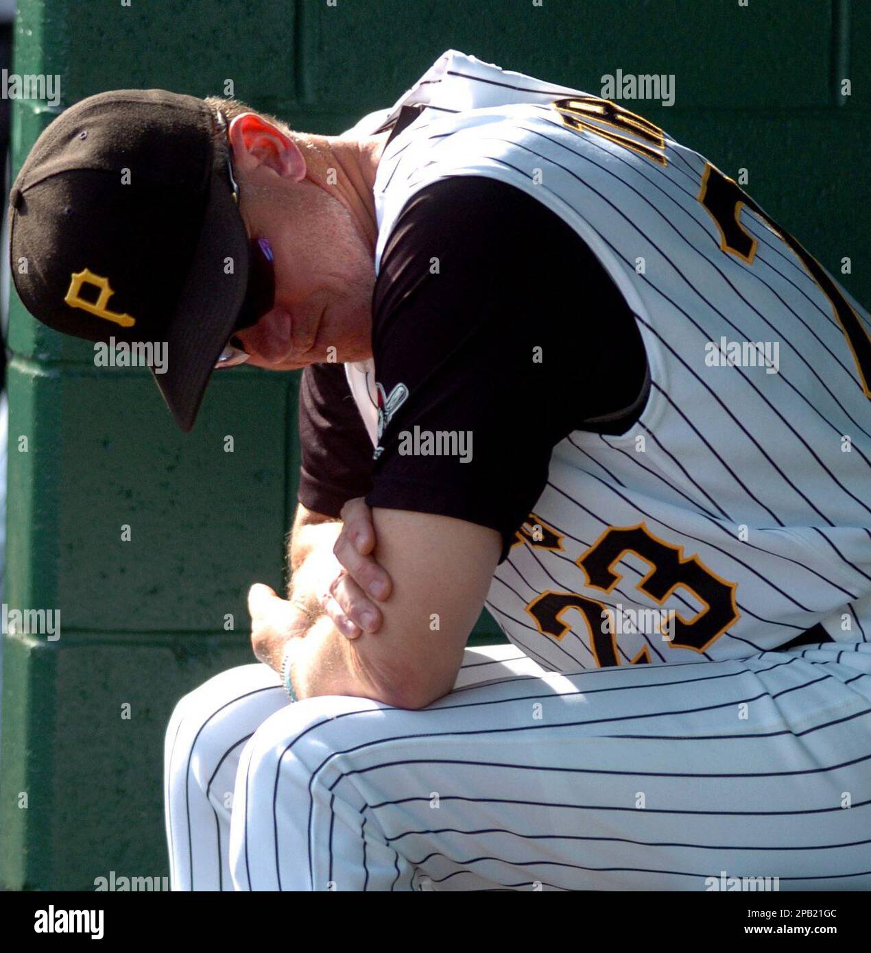 Pittsburgh Pirates manager Jim Tracy sits in the dugout after the ...
