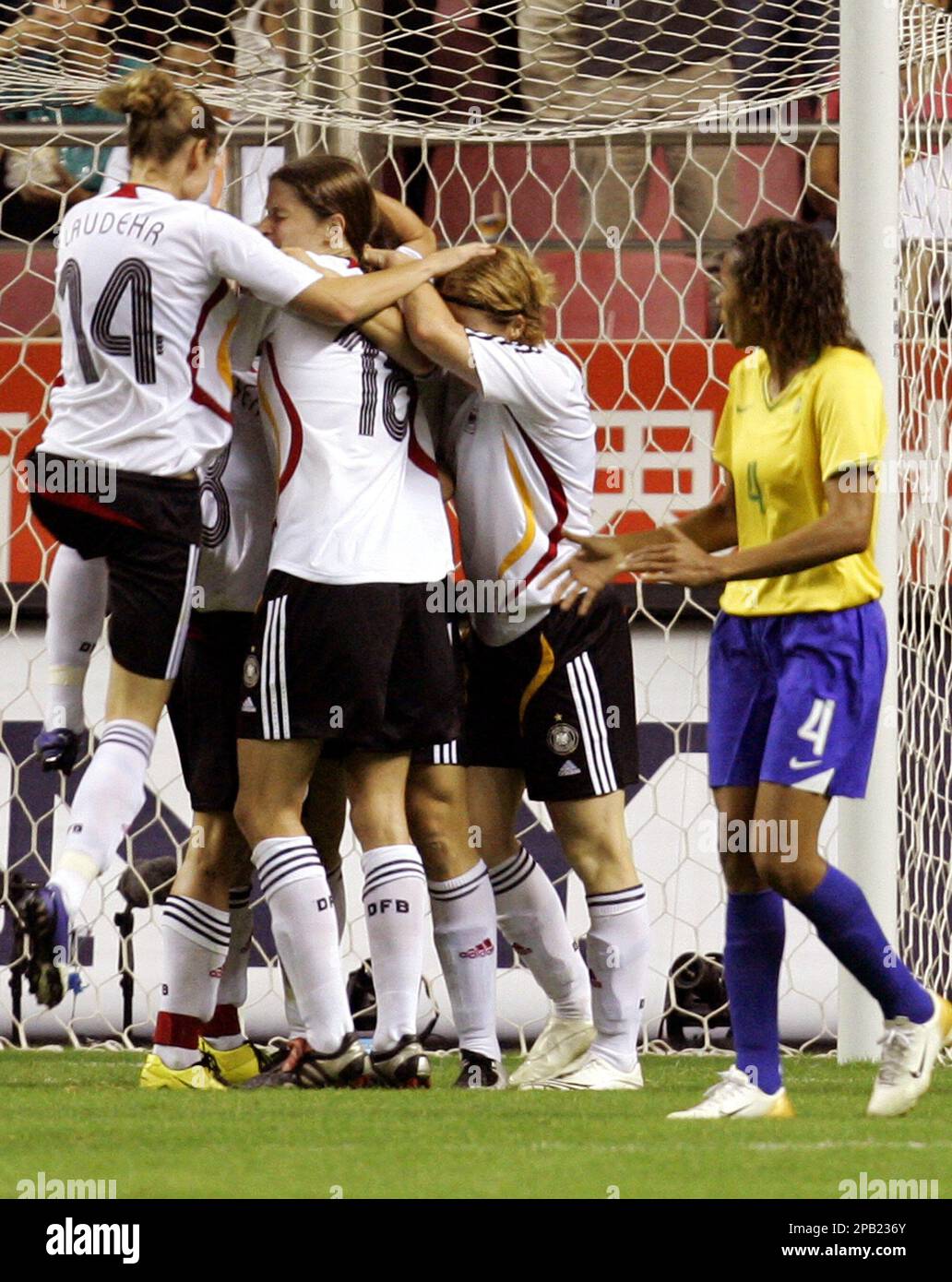 Germany's forward Birgit Prinz (9) scores a goal against Brazil during ...