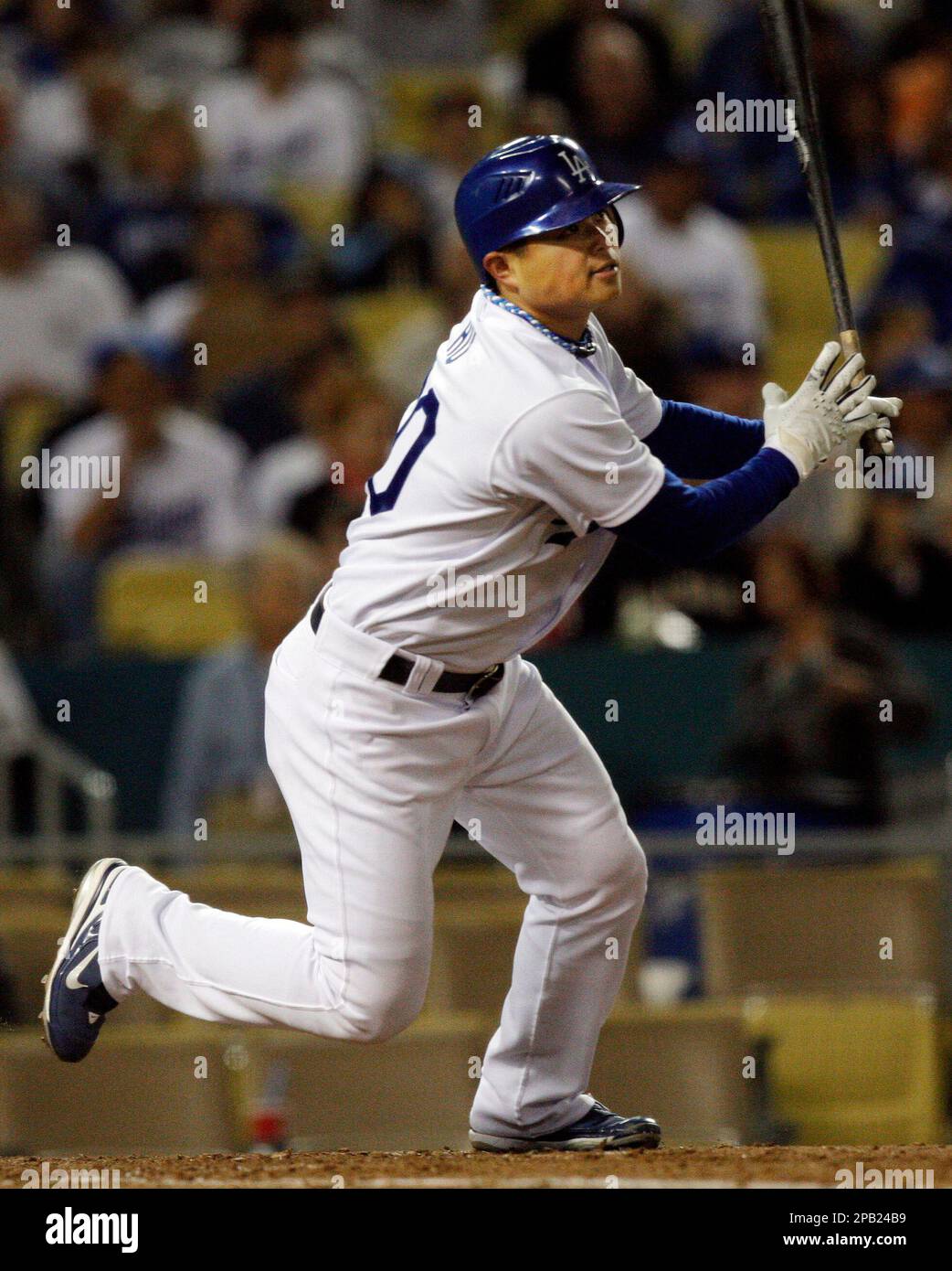 Los Angeles Dodgers' Chin-Lung Hu hits a triple off San Francisco ...