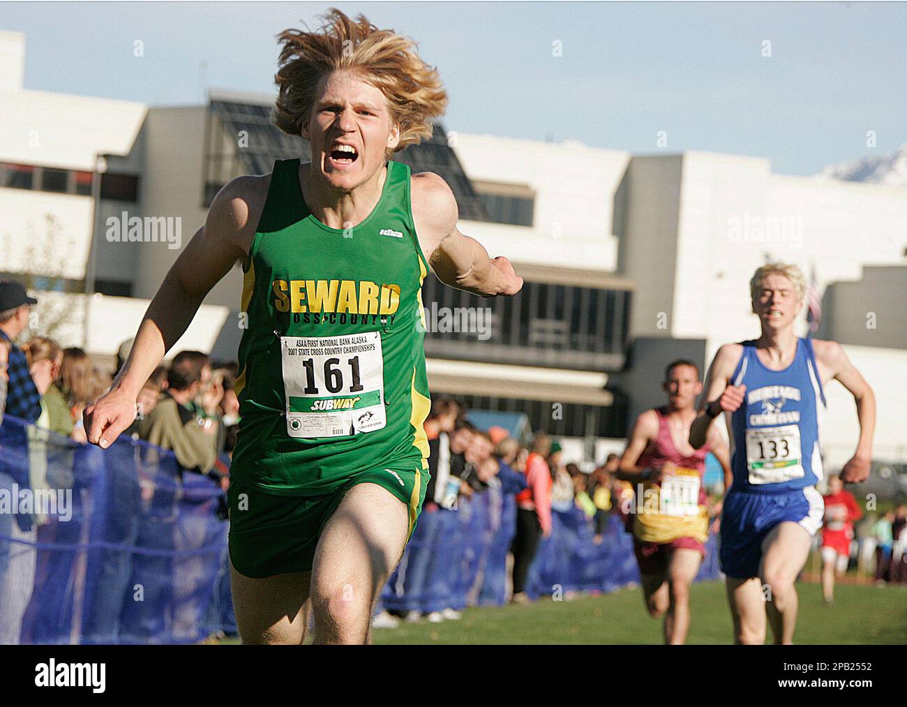Seward's Mark Chase lunges for the finish line in the boy's Class 1-2 ...