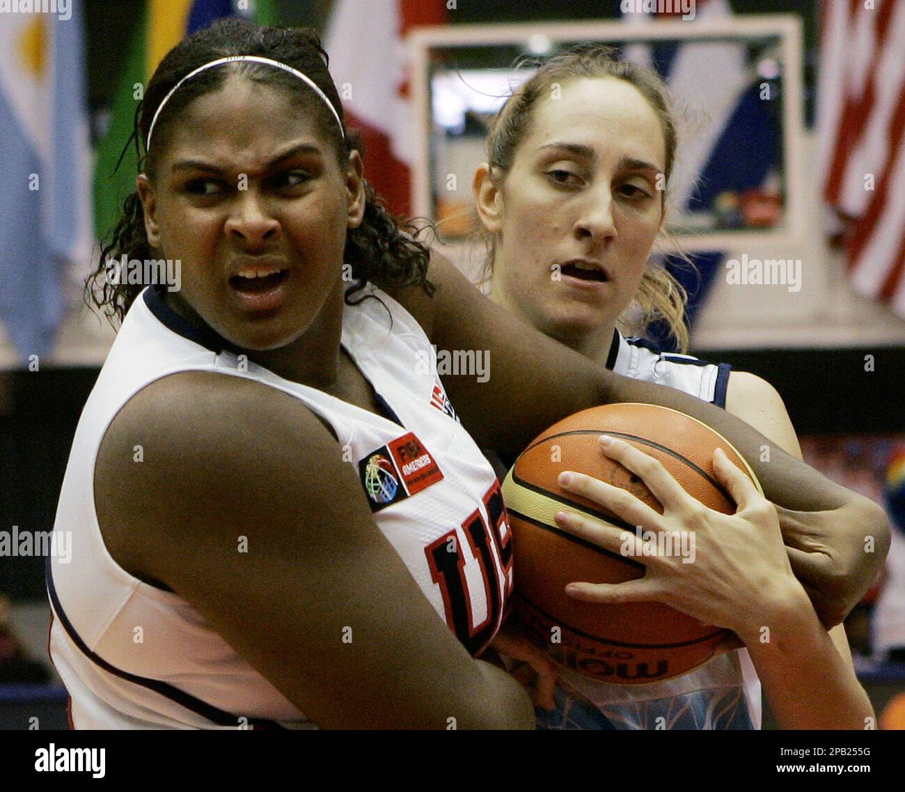 US' Courtney Paris, left, fights for the ball with Argentina's Maria ...