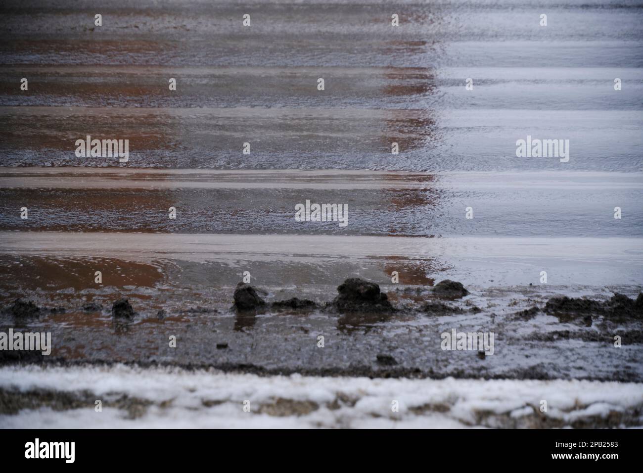 Puddle dirty water melted from hi-res stock photography and images - Alamy