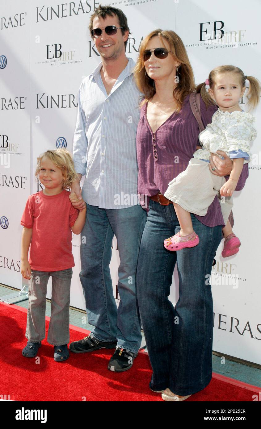 Noah Wyle and his wife Tracy arrive with their children Owen, left, and ...