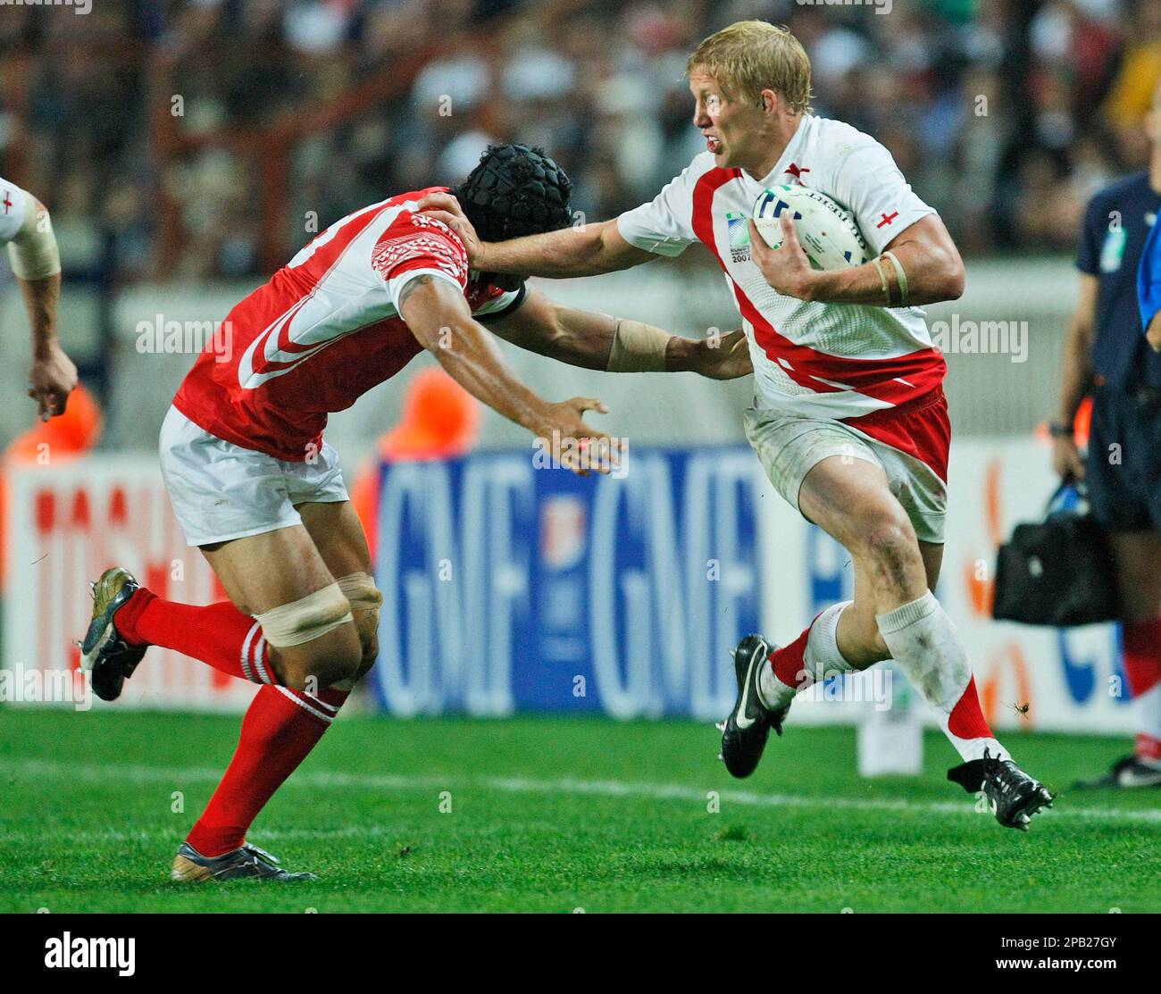 England's Lewis Moody, right, goes on the run during the Rugby World ...