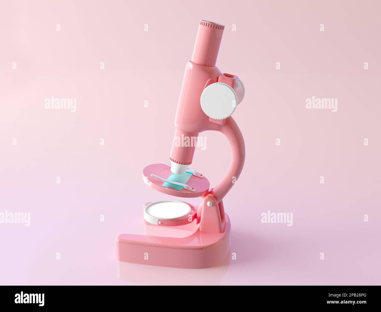 A soft pink plastic microscope on a pastel background. The concept of ...