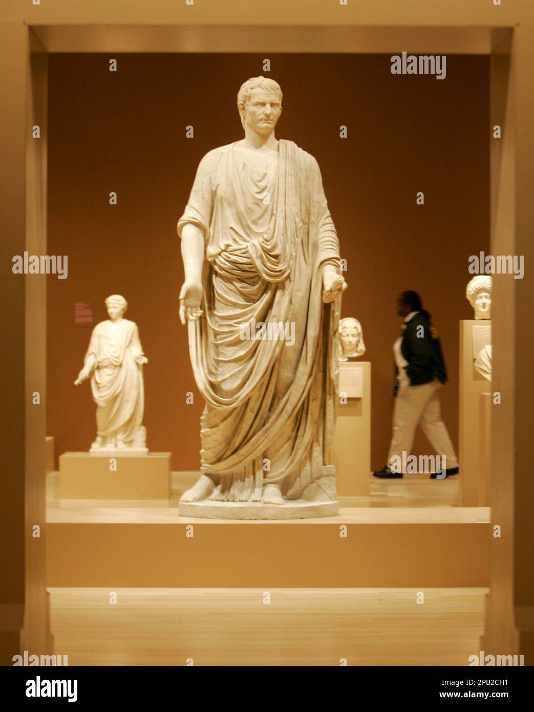 "Citizen Wearing a Toga" is displayed in the "Roman Art from the Louvre ...