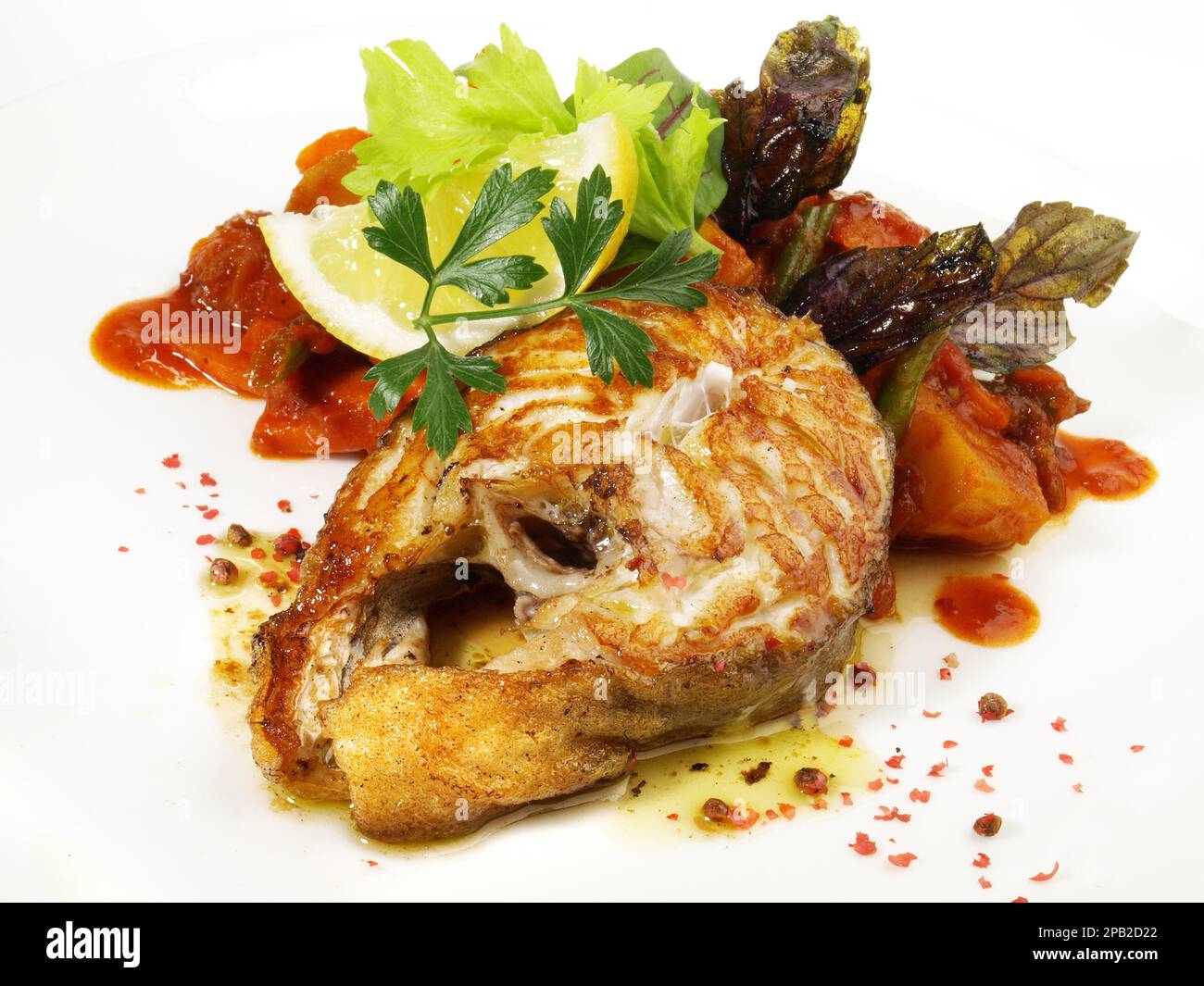 Cod Fish Chop on Tomato Stock Photo - Alamy
