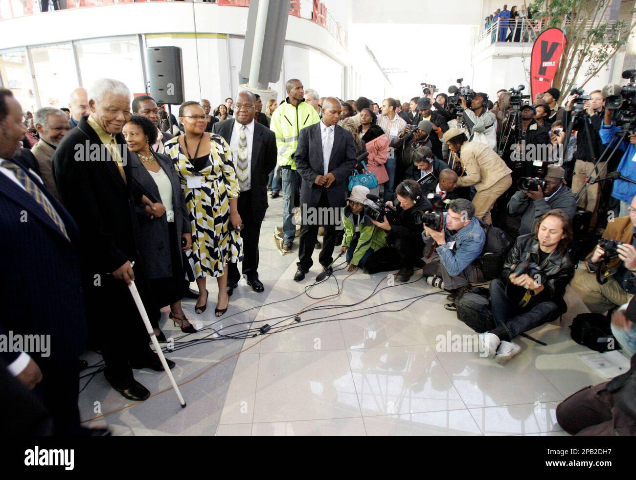 Former South African President Nelson Mandela, far left, stand during ...