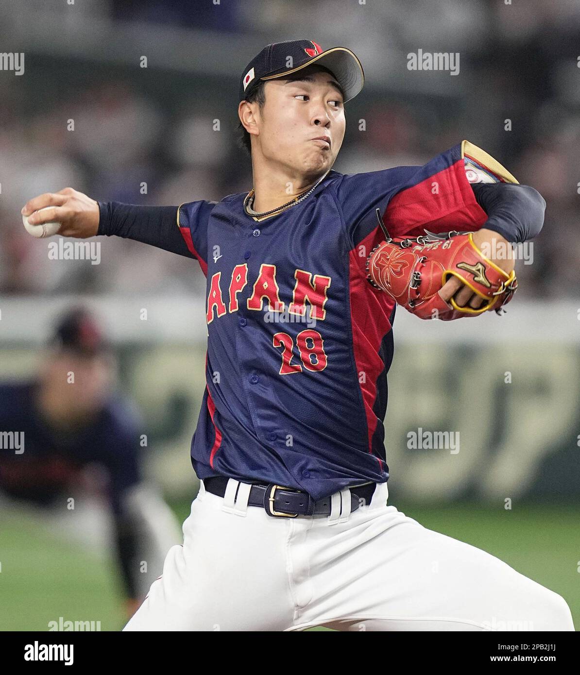 Hiroto Takahashi of Japan pitches against Australia in a World Baseball ...