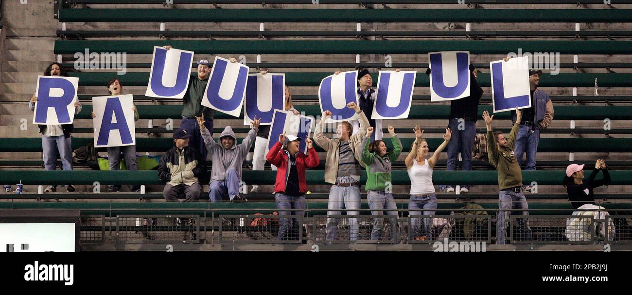 Seattle Mariners fans cheer after a single by Raul Ibanez against the ...