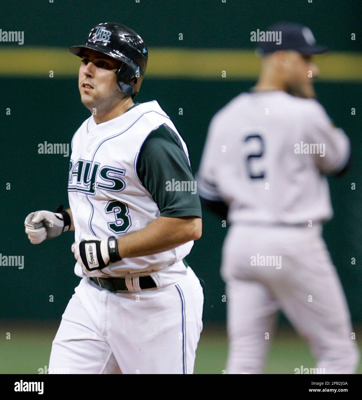 Tampa Bay Devil Rays' Jorge Velandia (3) runs past New York Yankees ...