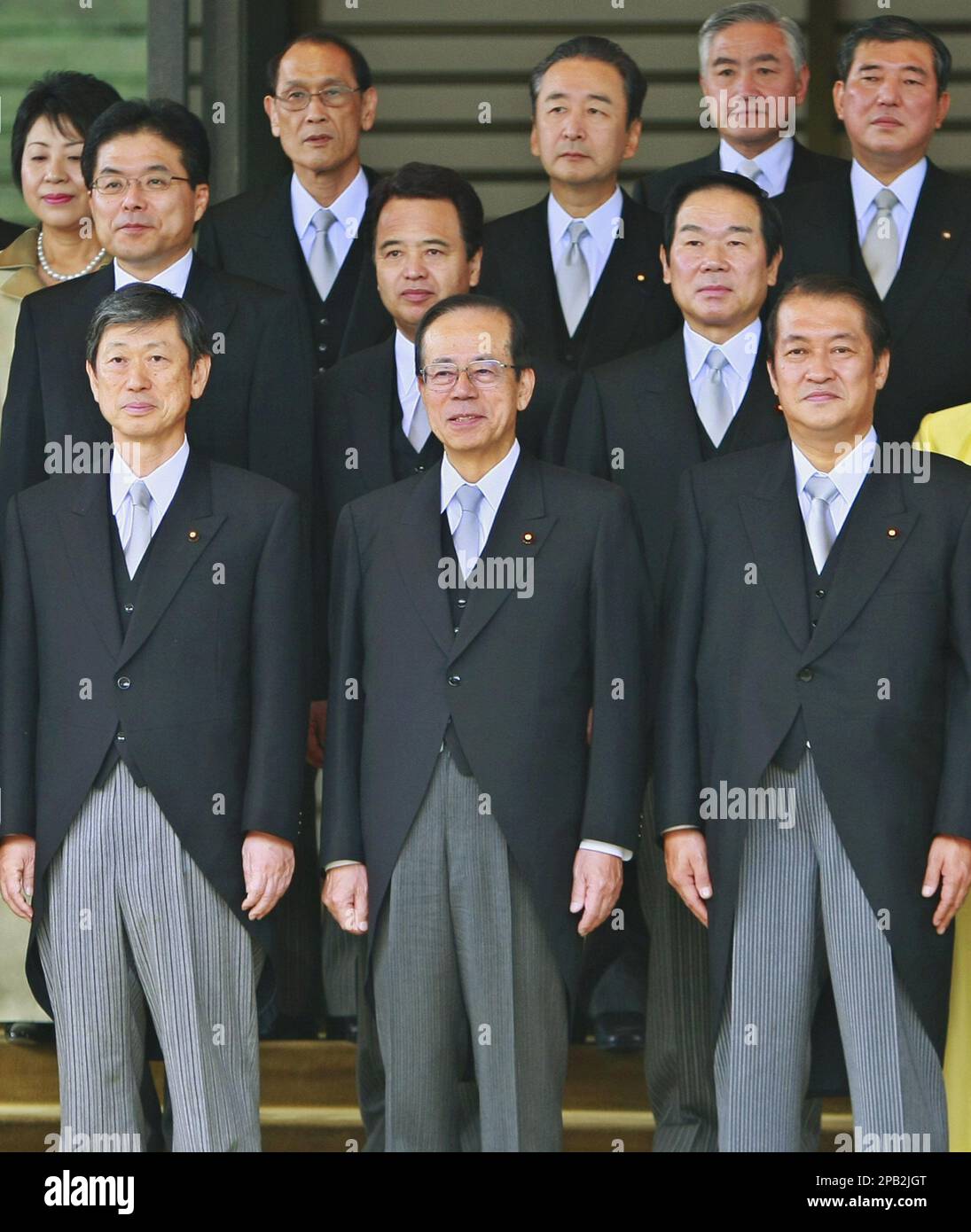 Japan's new Prime Minister Yasuo Fukuda, front row center, smiles as he ...