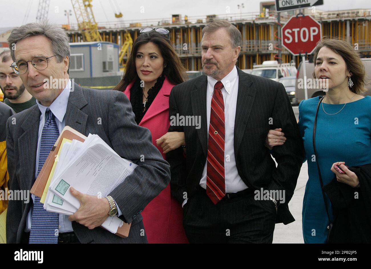 Former Alaska state lawmaker Pete Kott, second from right, walks from ...