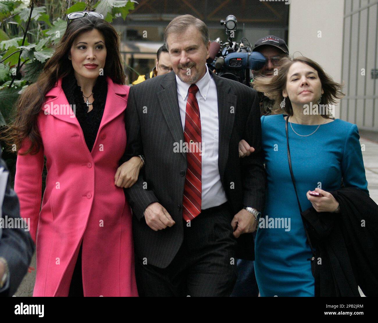 Former Alaska state lawmaker Pete Kott, center, walks from the federal ...