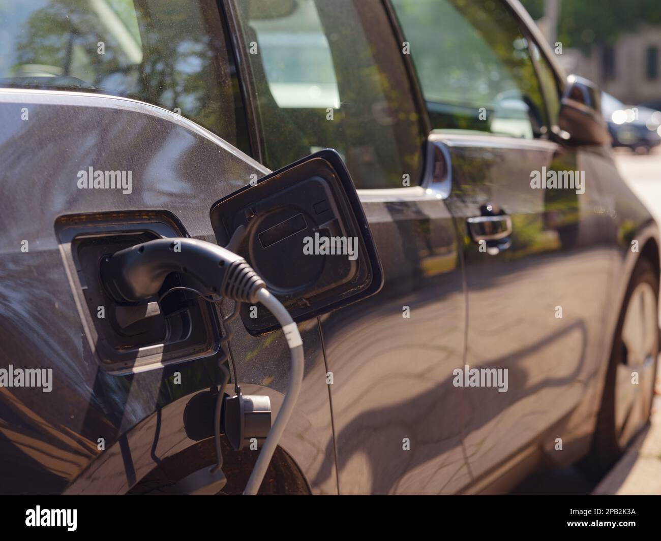 Munich, Germany - August 5, 2022 : Electric car with opened charging ...