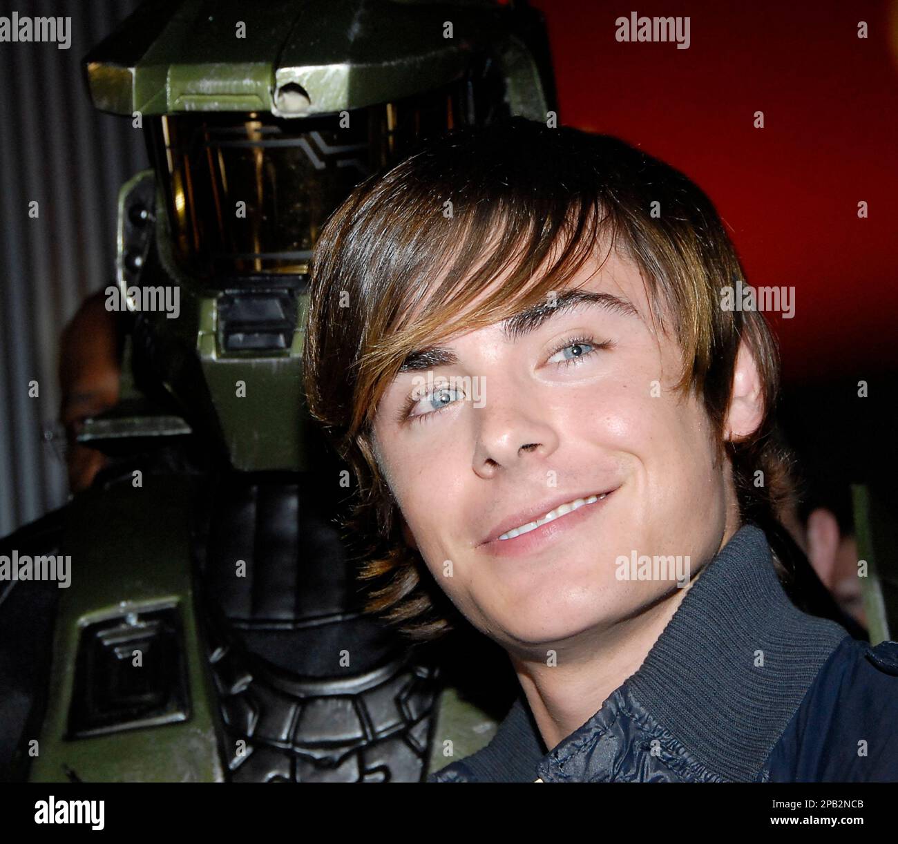 Actor Zac Efron, right, and "Halo 3" star Master Chief, left, at the ...