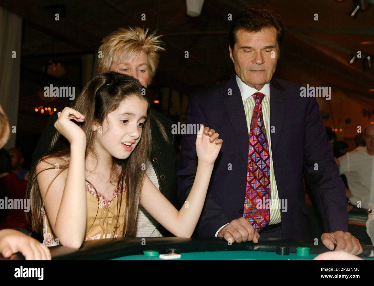 Laura Marano, left, and Fred Willard play a card game at the FOX Fall ...
