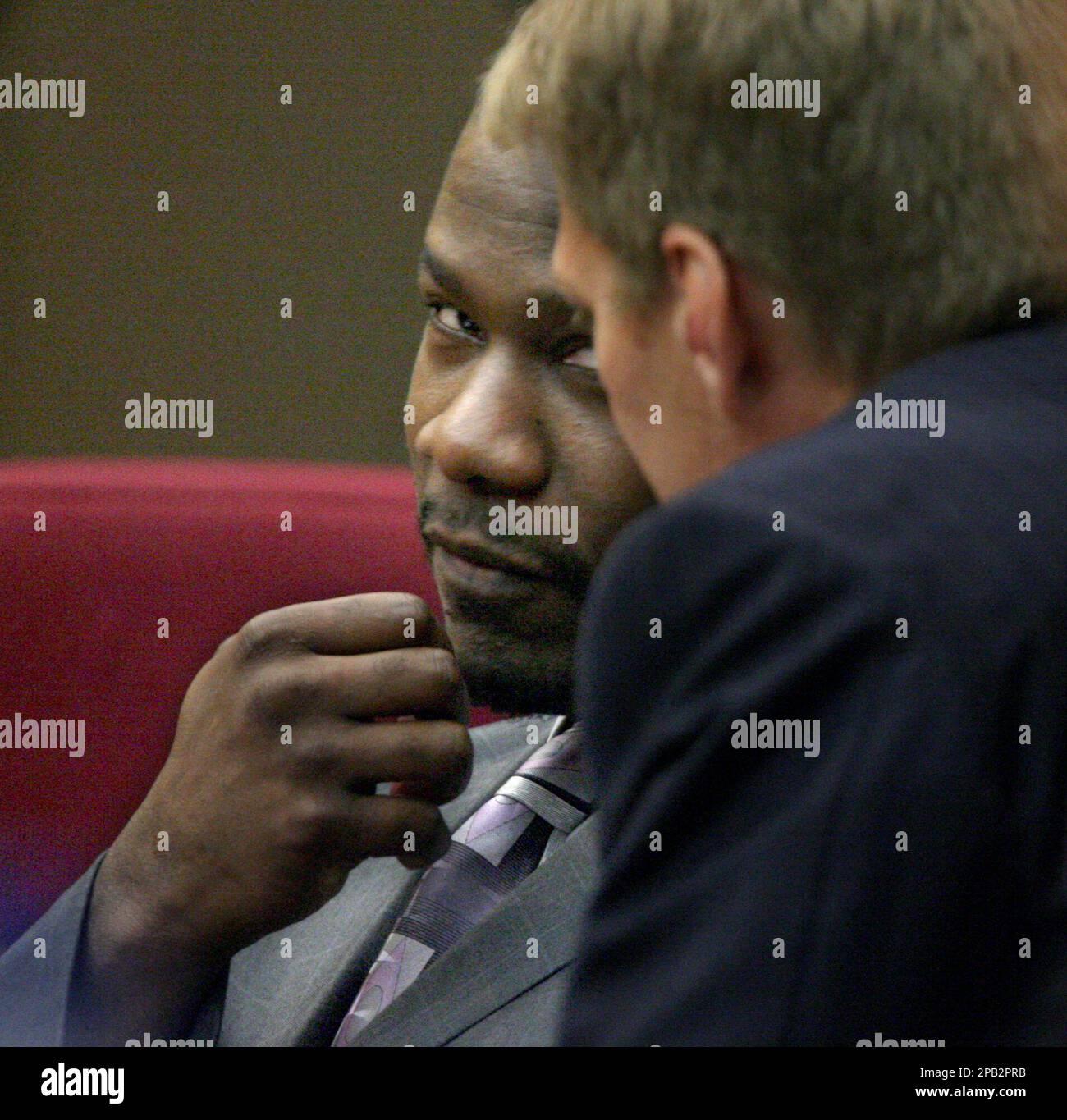 Defendant Brian Nichols, left, and attorney Robert McGlasson are shown ...