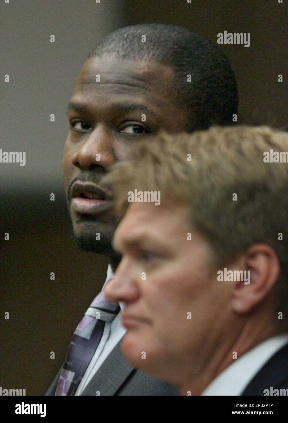 Defendant Brian Nichols, left, and attorney Robert McGlasson are shown ...