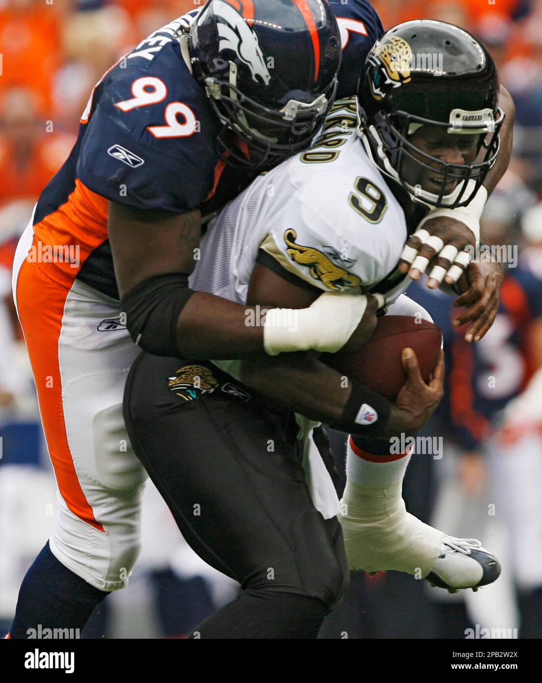 Jacksonville Jaguars' David Garrard (9) is sacked by Denver Broncos ...