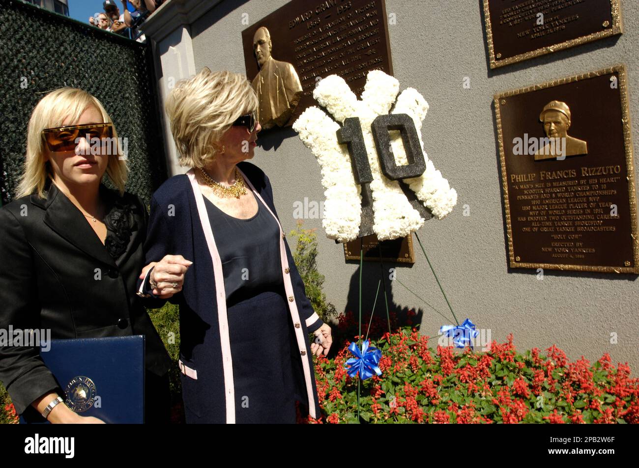 Cora Rizzuto, right, the wife of the late Phil Rizzuto, and ...