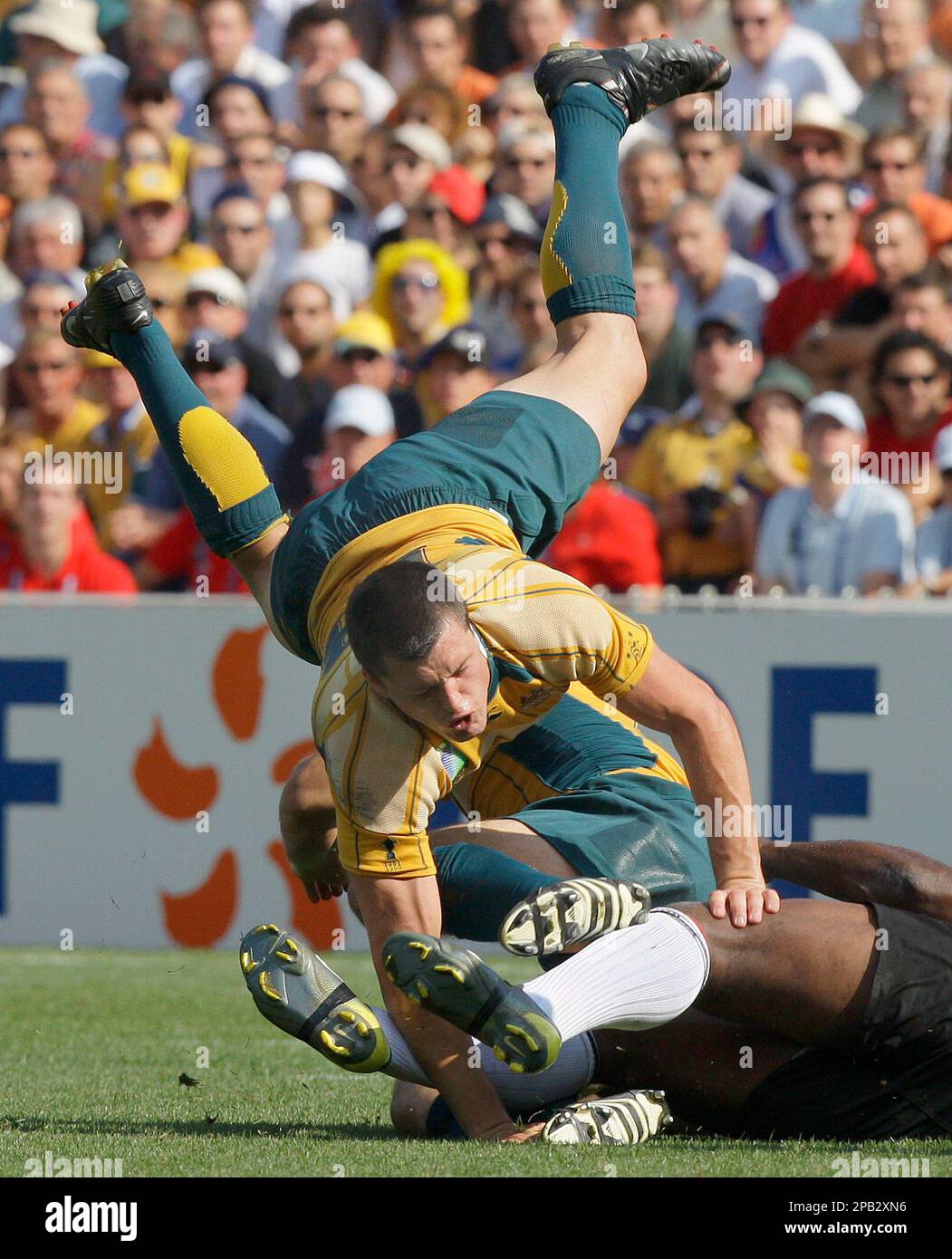 Australia's Adam Ashley-Cooper is sent flying in a challenge during the ...