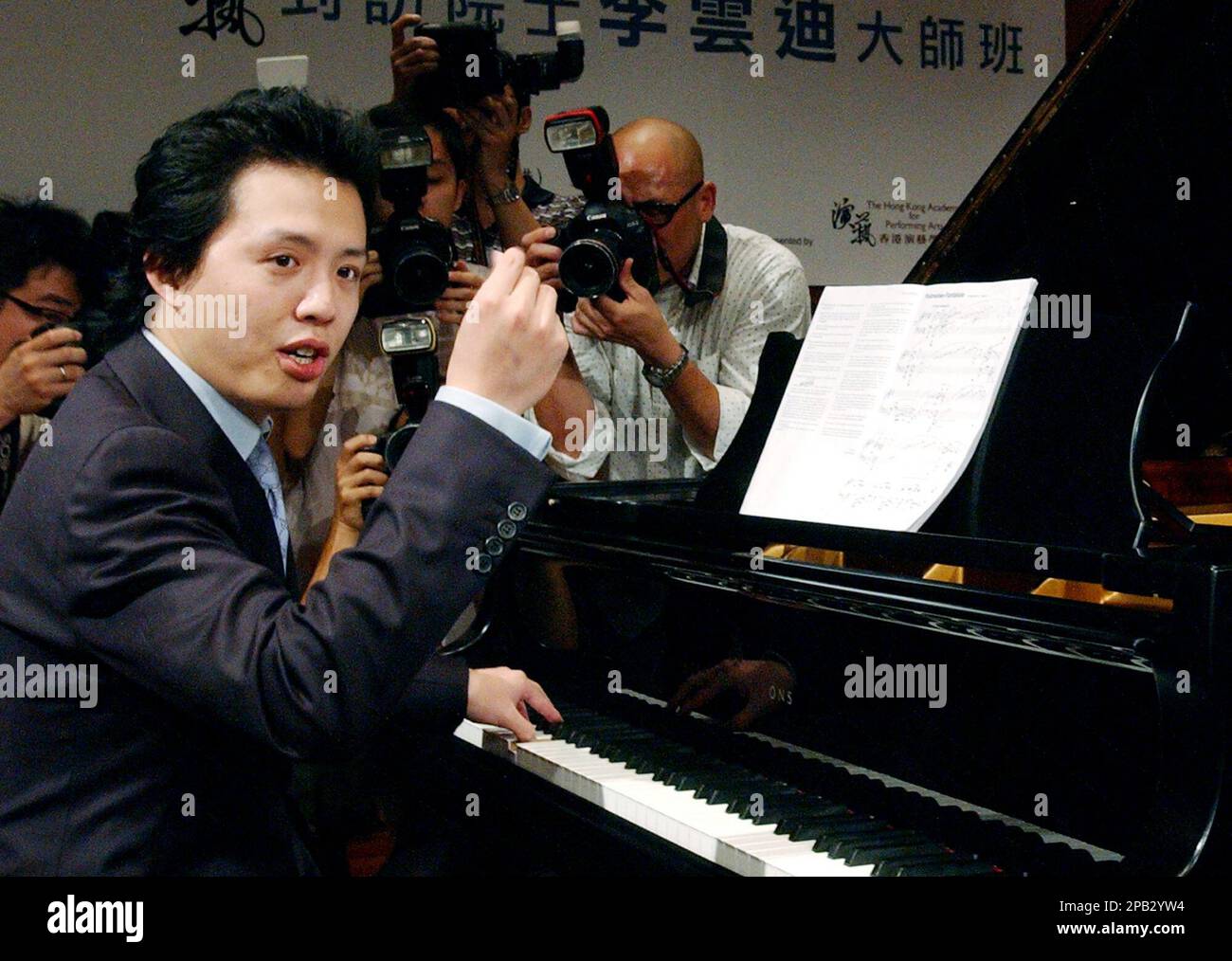 Chinese pianist Yundi Li demonstrates his piano skills for Hong Kong ...
