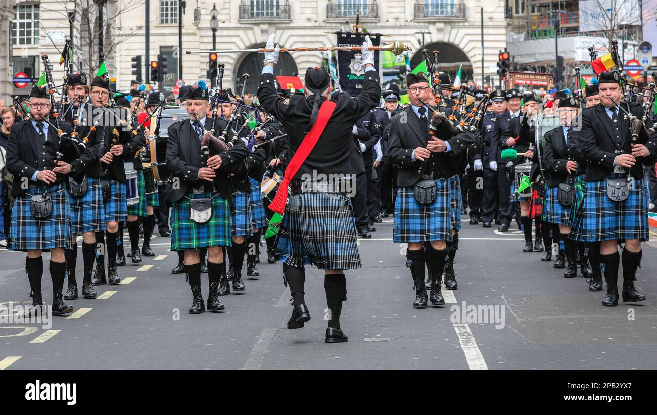 London, UK. 12th Mar, 2023. A group of Irish pipers take part to ...