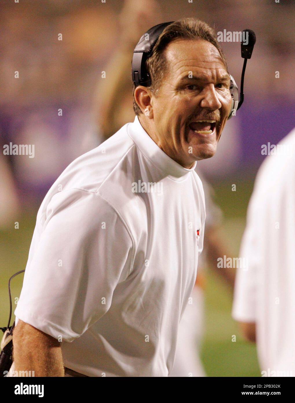 SMU coach Phil Bennett yells toward the field during the fourth quarter ...