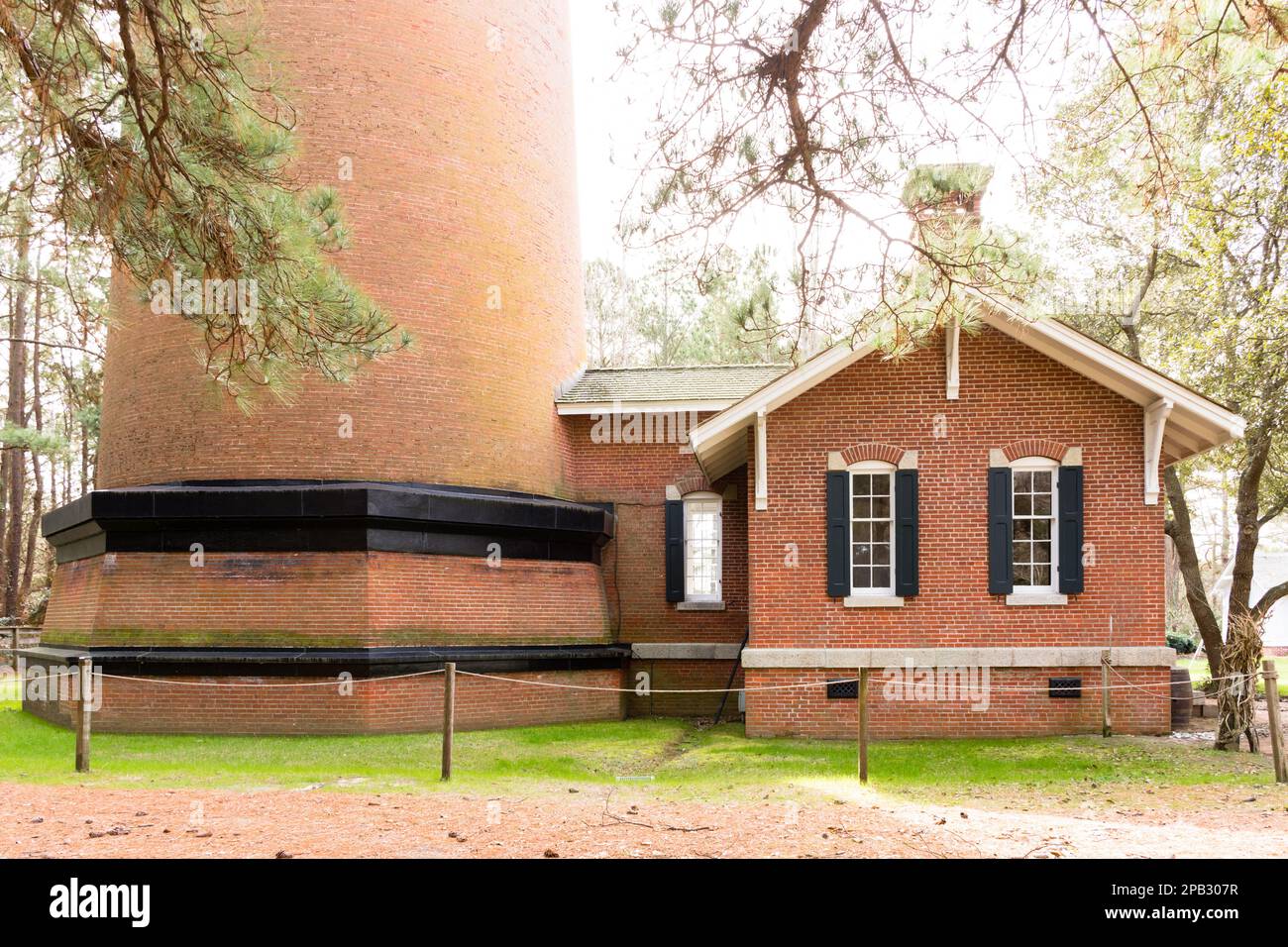 Light-keeper's house and base of Currituck Island Lighthouse. Red brick ...