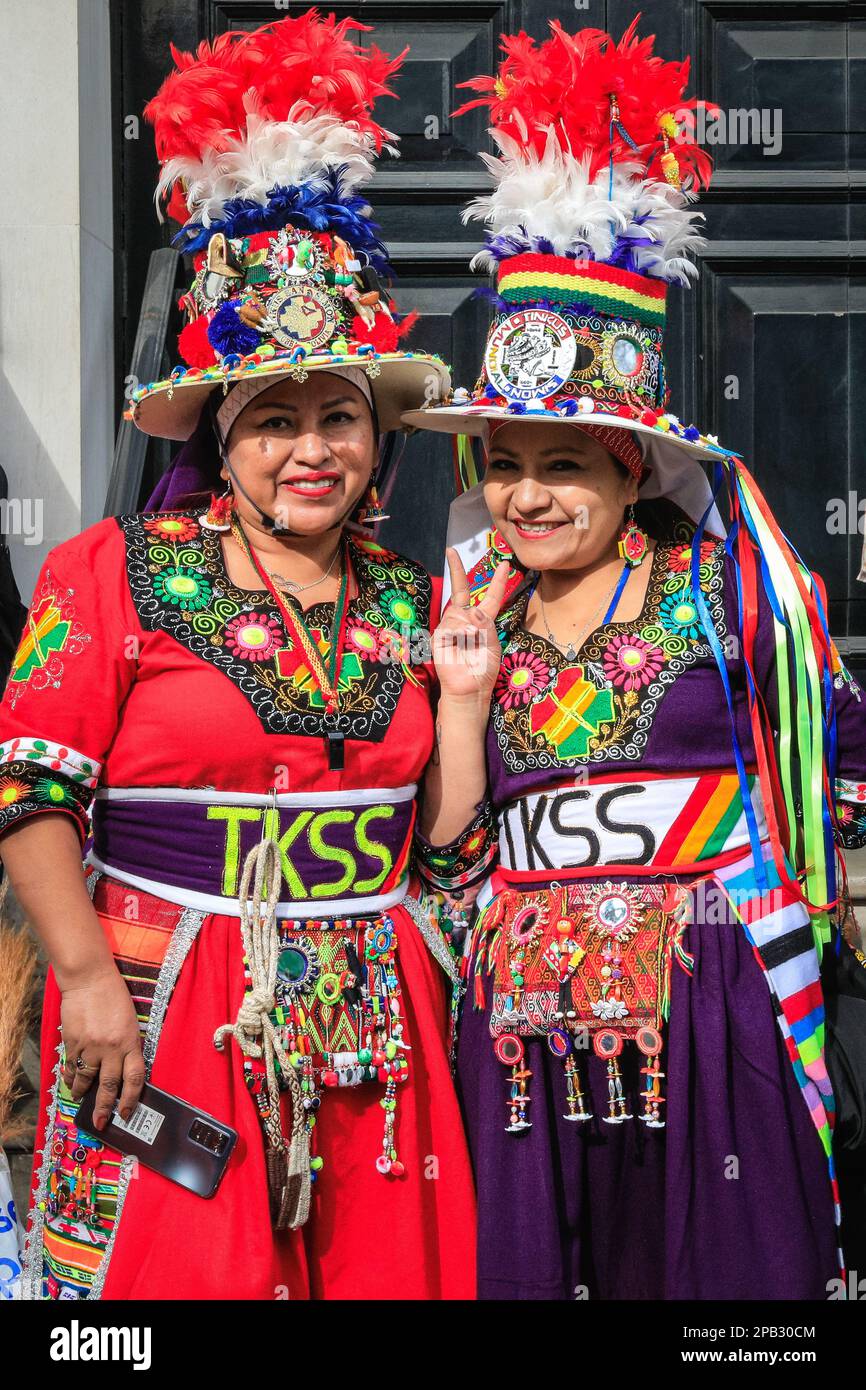 London, UK. 12th Mar, 2023. Two Bolivian dancers in their colourful ...