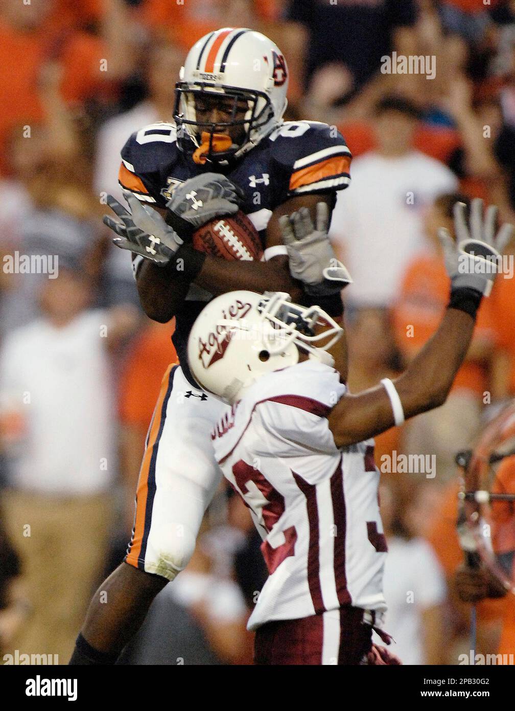 Auburn receiver Rodgeriqus Smith catches a pass for a 58-yard touchdown ...