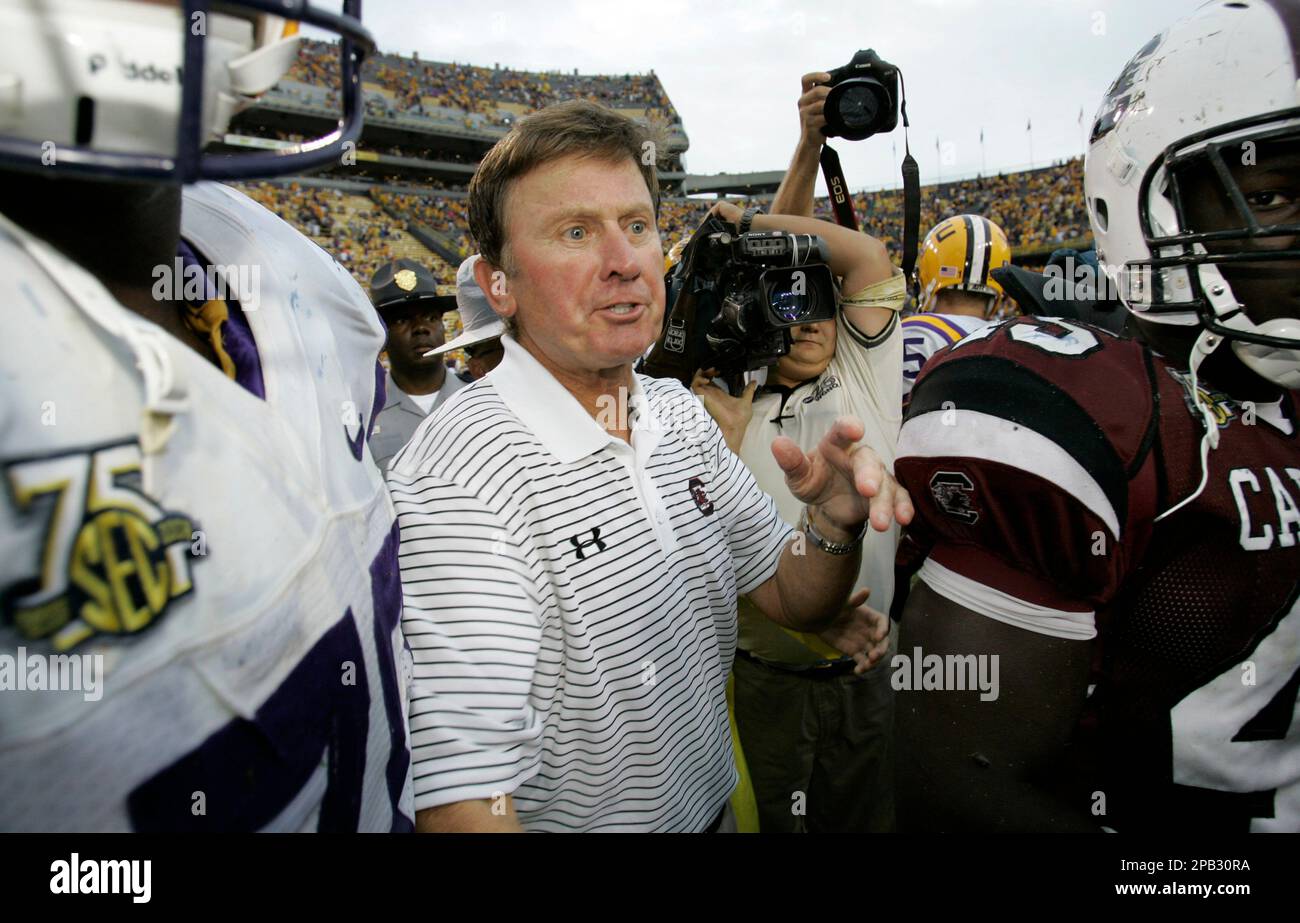 South Carolina coach Steve Spurrier heads to midfield to greet LSU ...