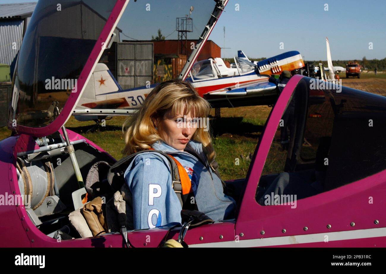 Russian female pilot Svetlana Kapanina prepares her Sukhoi Su-26 jet ...