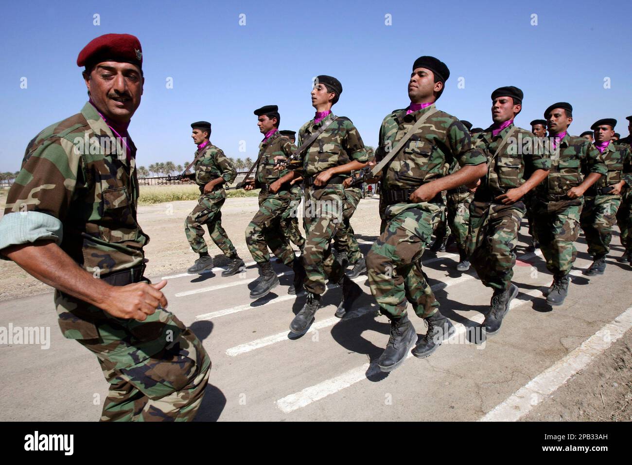 Iraqi National police cadets demonstrate their skills at a graduation ...