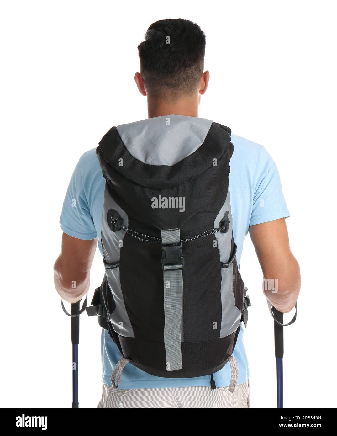 Male hiker with backpack and trekking poles on white background, back ...