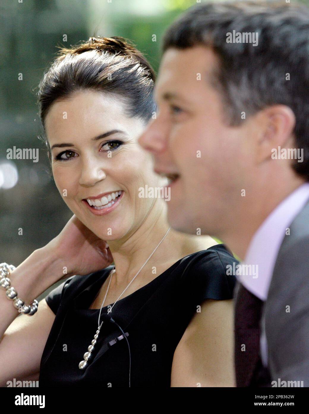 Princess Mary looks on as her husband Crown Prince Frederik of Denmark ...