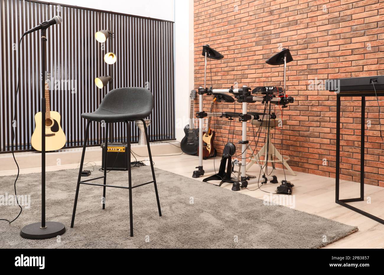 Modern music studio interior with different electronic instruments ...