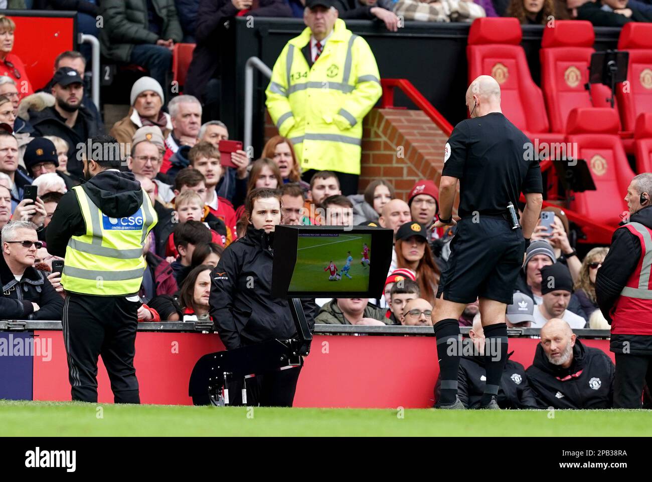 Referee Anthony Taylor checks the pitch side VAR screen during the ...