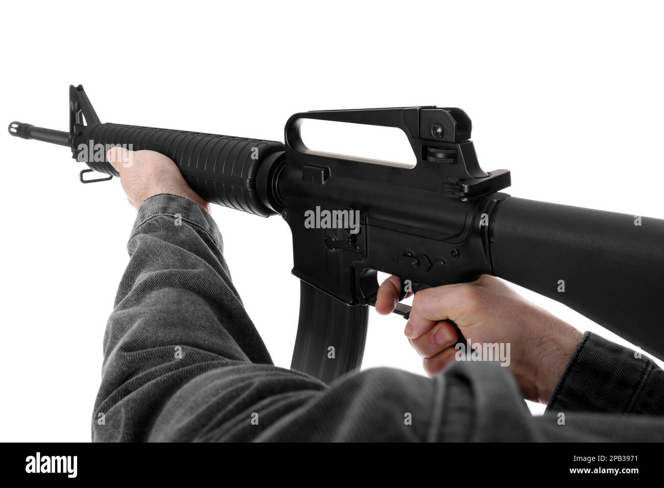 Assault gun. Man aiming rifle on white background, closeup Stock Photo ...