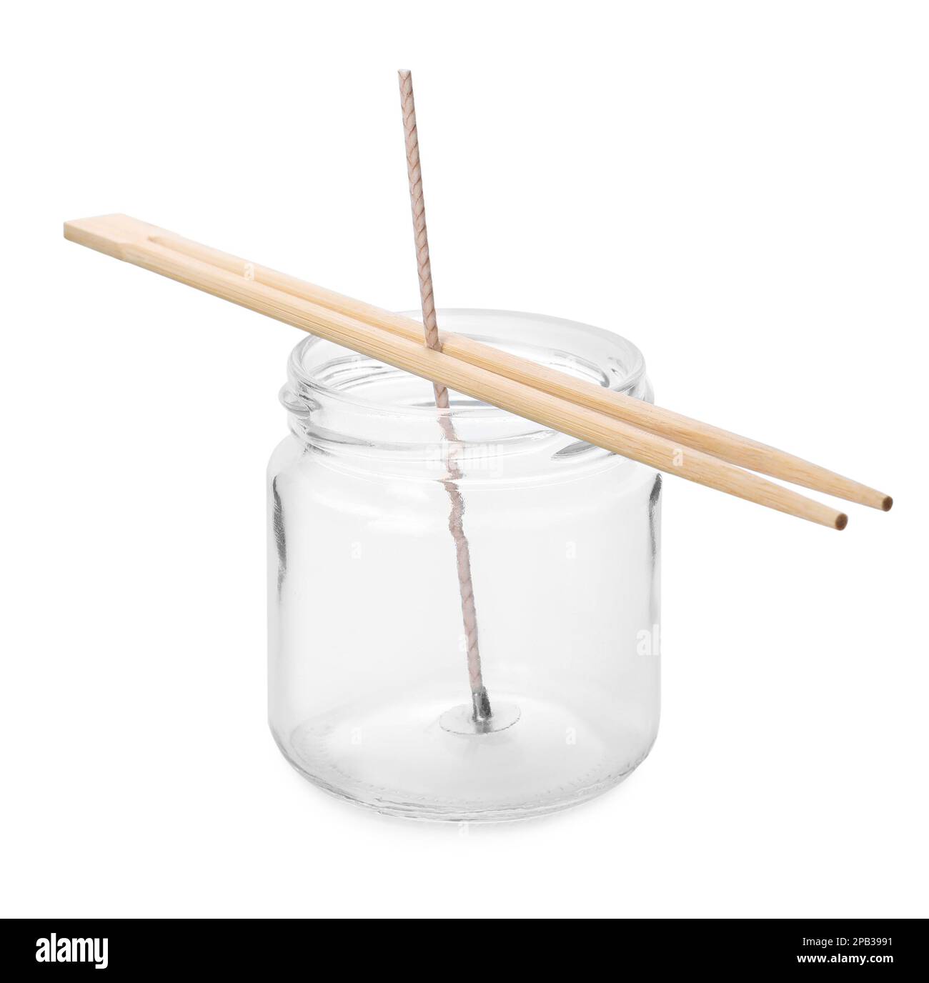 Glass jar with chopsticks as stabilizer on white background. Making ...