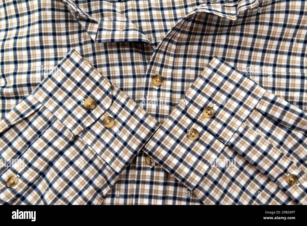Men's shirt. Plaid shirt sleeve with buttons. Piece of clothing. Button ...