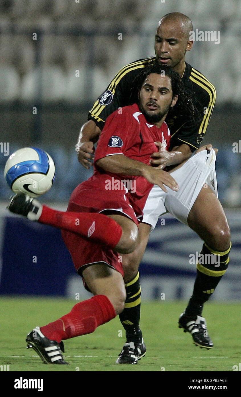 Hapoel Tel Aviv's, Lior Asulin, front, vies for the ball with AIK Solna ...