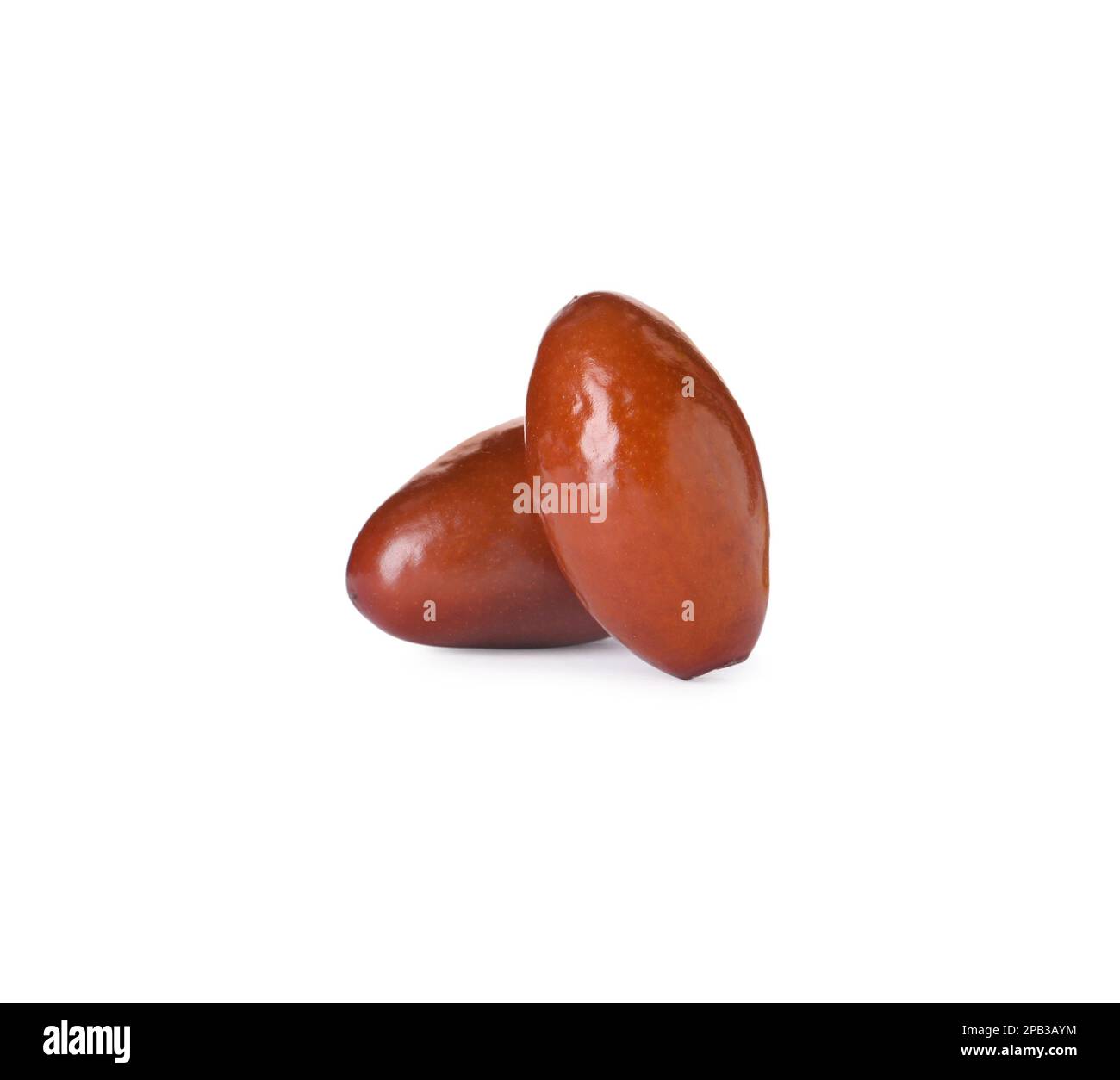 Two ripe red dates on white background Stock Photo - Alamy
