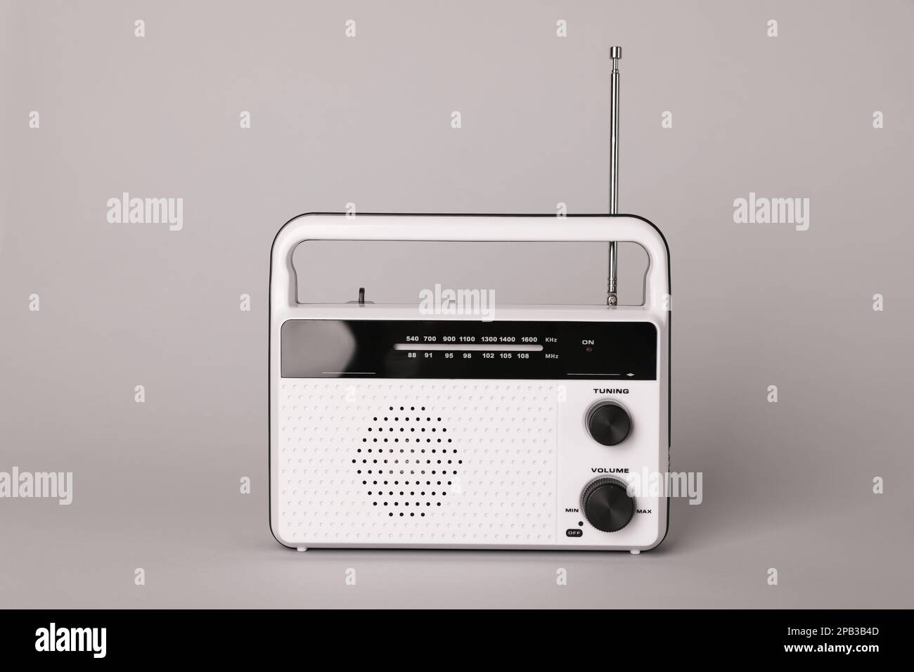 Portable retro radio receiver on grey background Stock Photo - Alamy