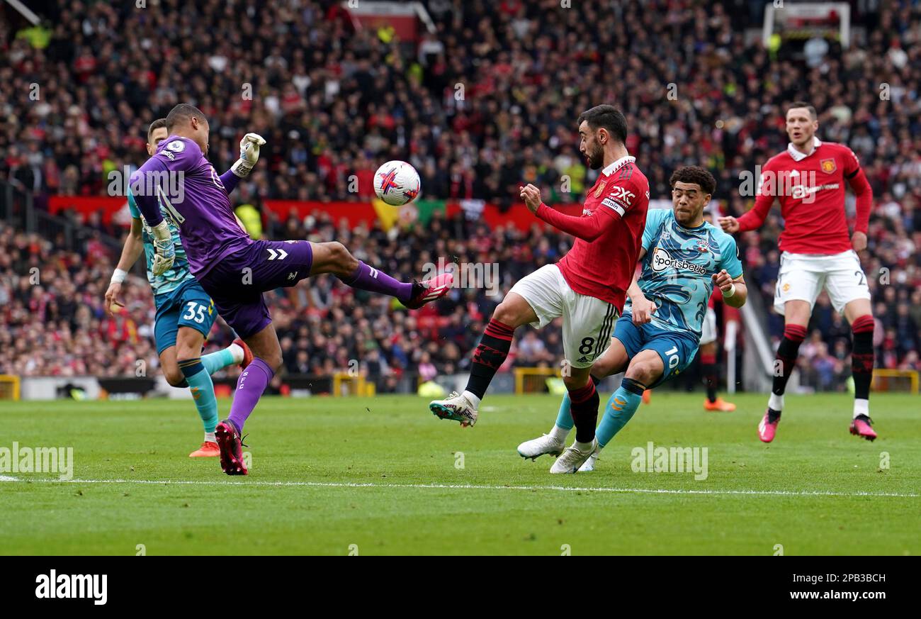 Manchester United's Bruno Fernandes has a shot at goal under pressure ...