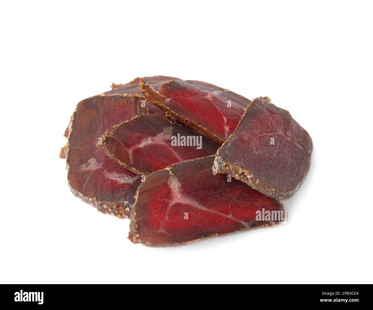 Delicious dry-cured beef basturma slices on white background Stock ...