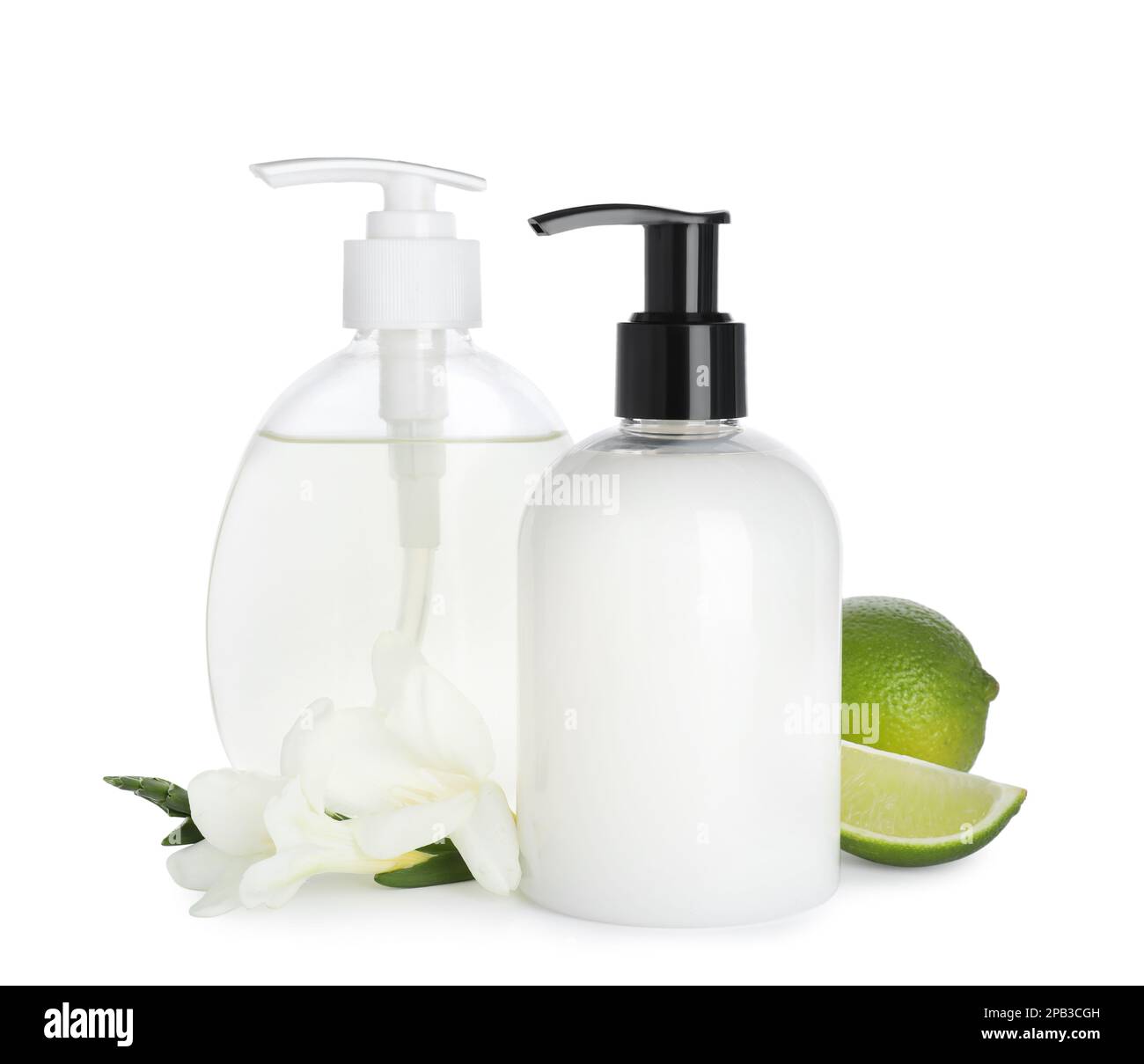 Dispensers With Liquid Soap Freesia Flowers And Limes On White