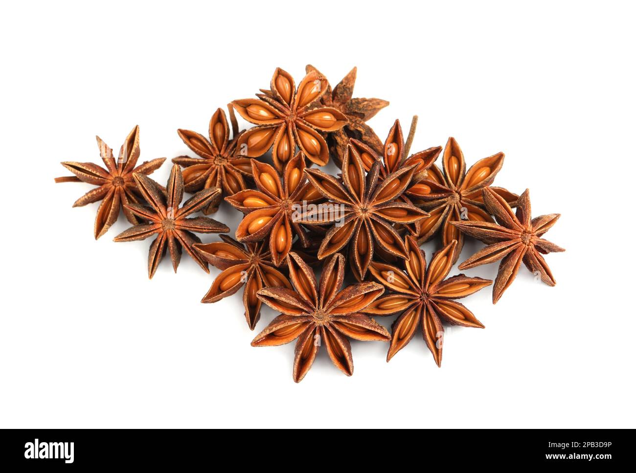 Dry anise stars with seeds on white background Stock Photo - Alamy